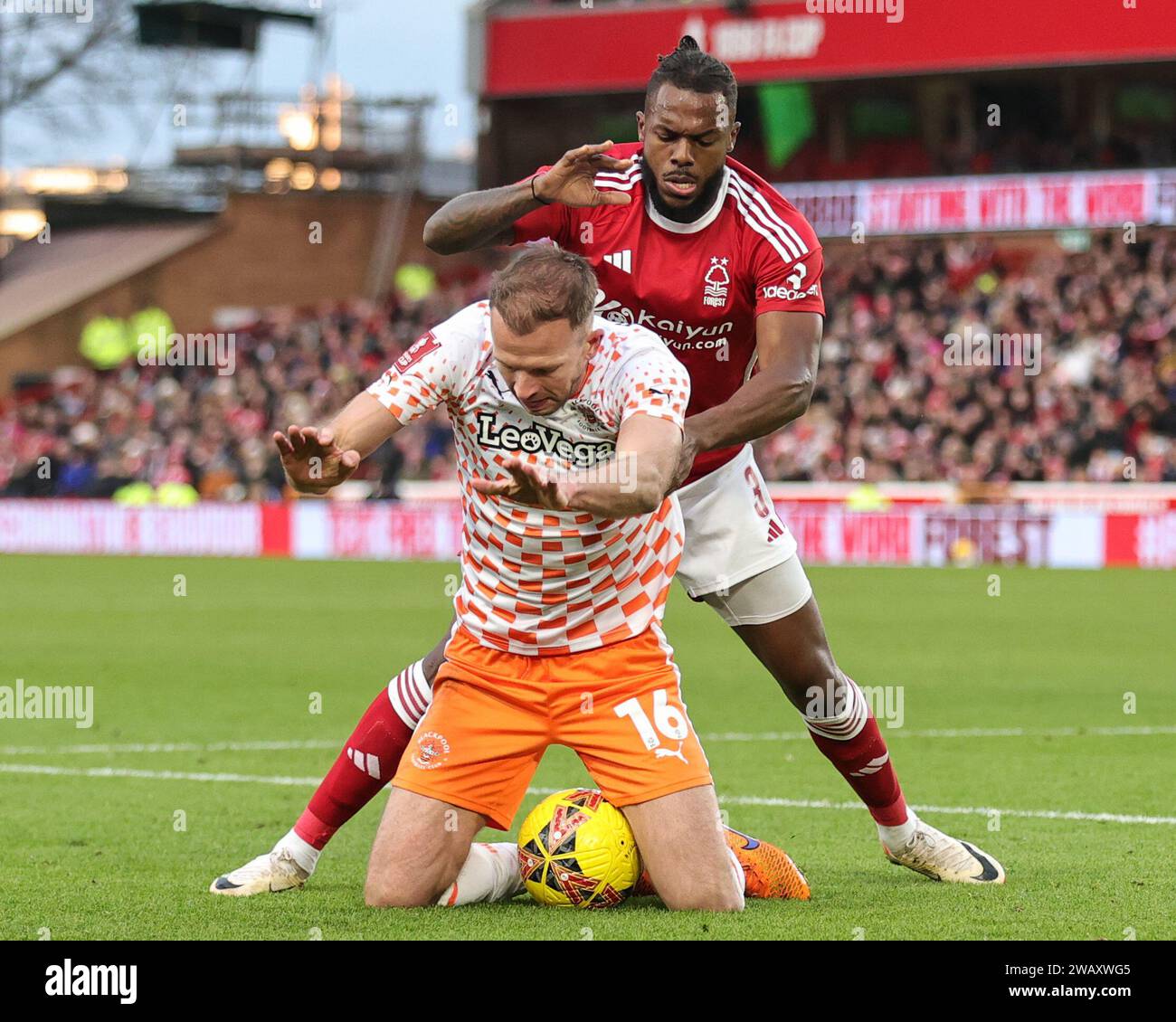 Nottingham, UK. 07th Jan, 2024. Jordan Rhodes of Blackpool and Nuno ...