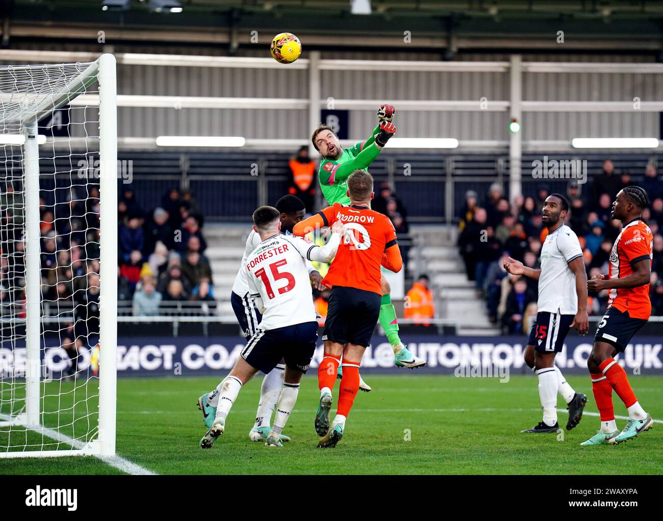 Luton Town goalkeeper Tim Krul attempts to clear the ball during the ...