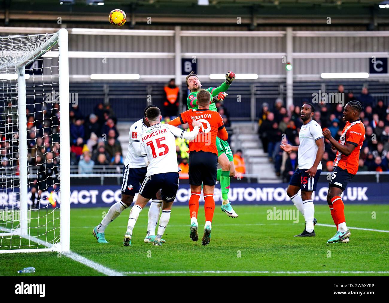 Luton Town goalkeeper Tim Krul attempts to clear the ball during the ...