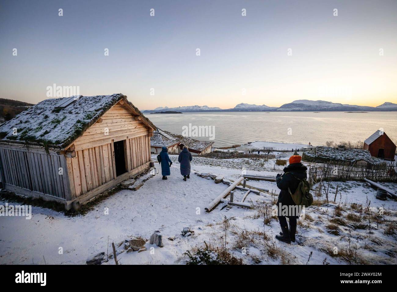 People walk around a Sami settlement during a visit to the medieval ...
