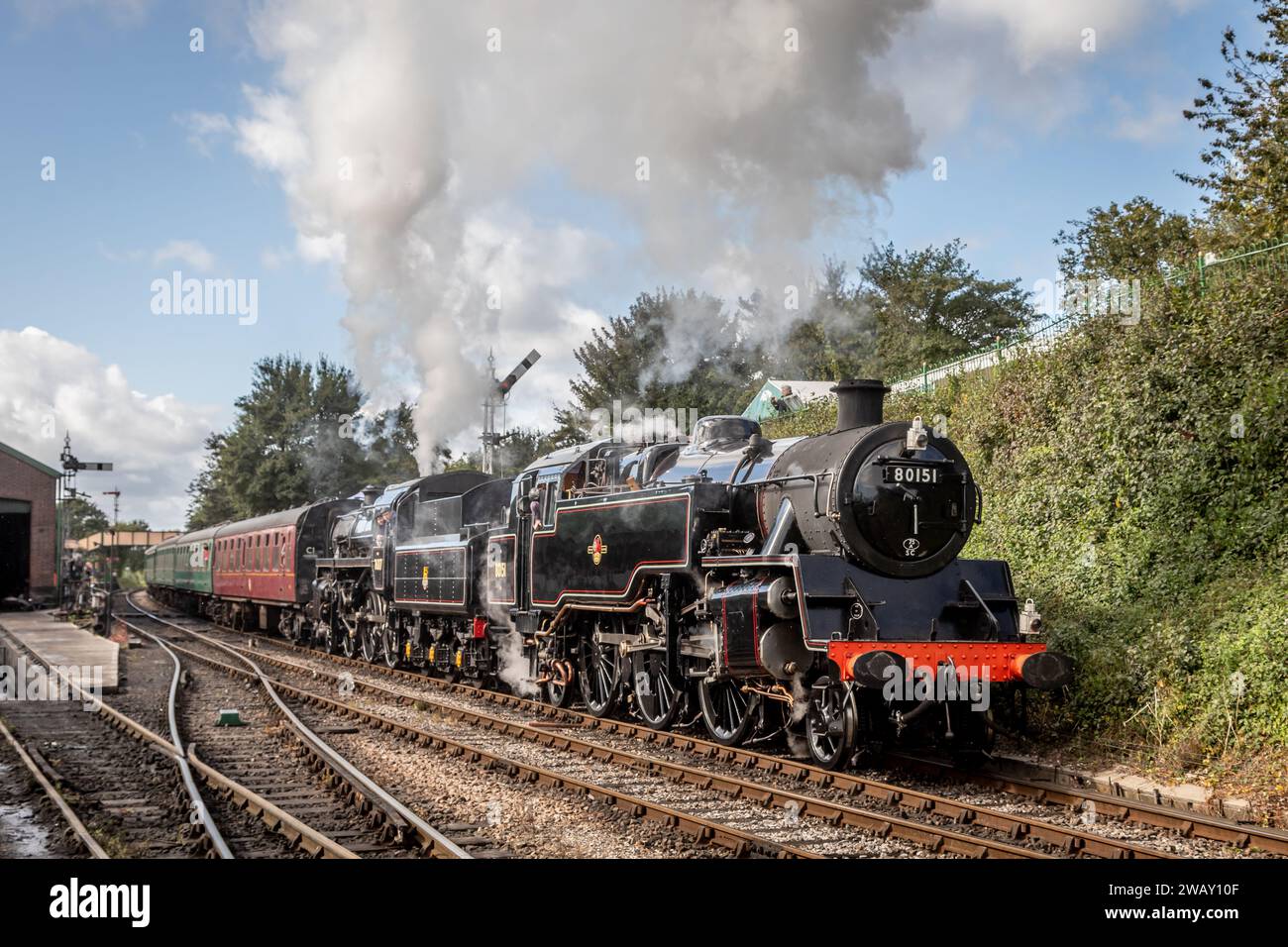 BR '4MT' 2-6-4T No. 80151 and BR 'Class 4' 2-6-0 No. 76017 depart ...
