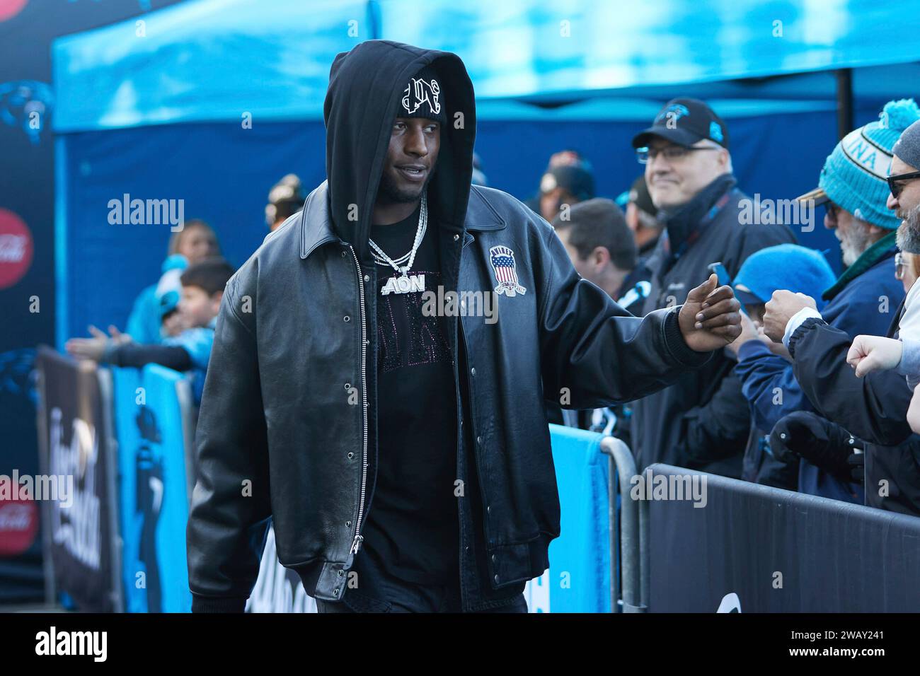 Carolina Panthers tight end Stephen Sullivan (84) bumps fists with a ...