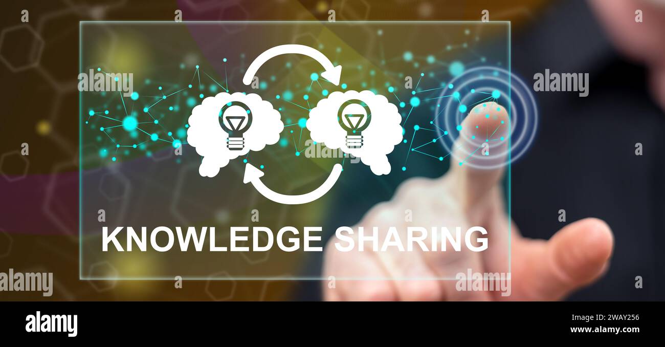 Man touching a knowledge sharing concept on a touch screen with his ...