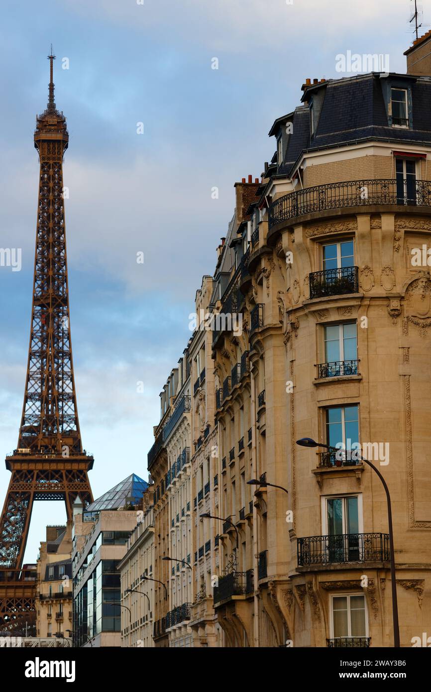 The facade of traditional French house with typical balconies and ...
