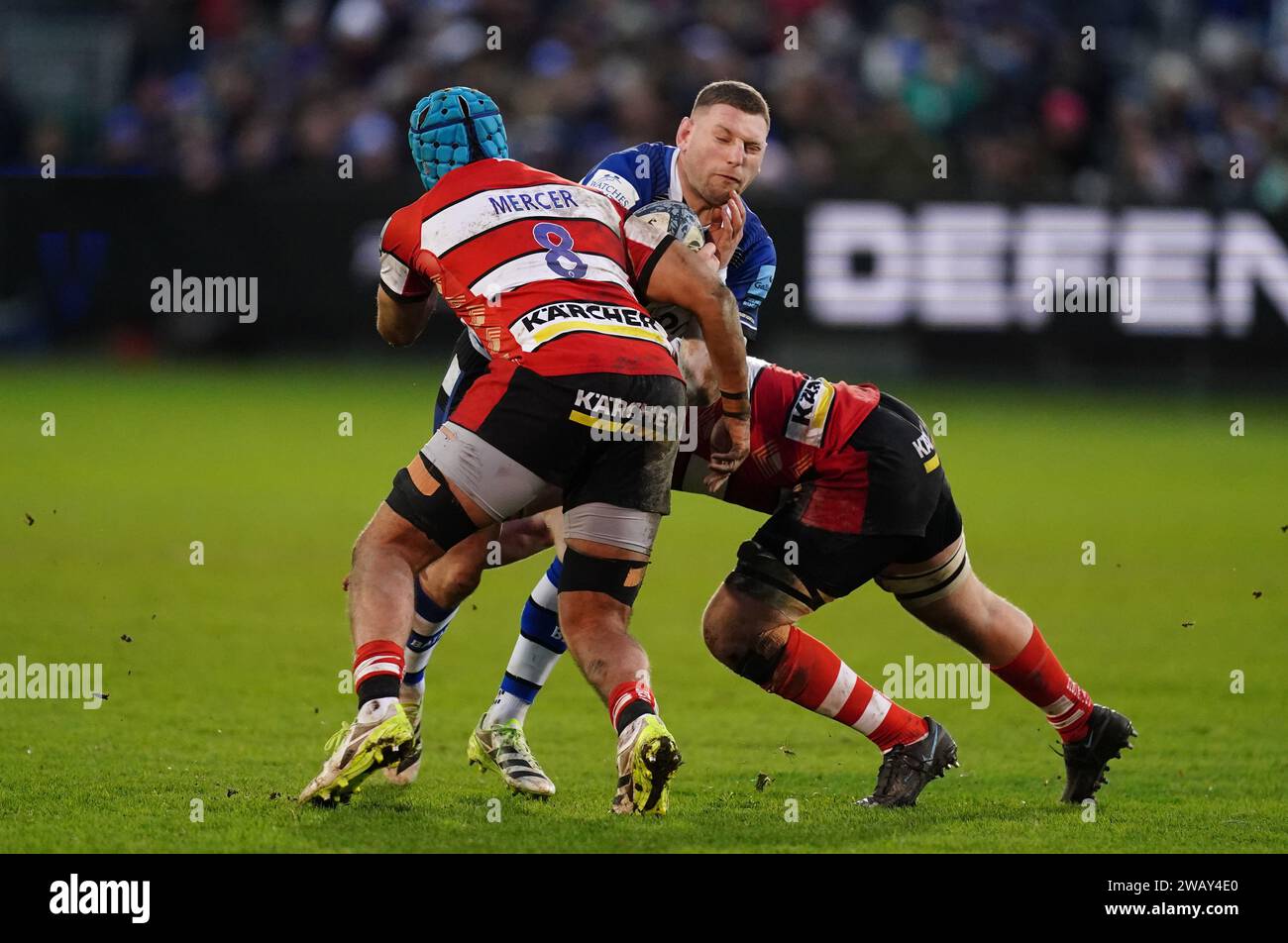 Bath's Finn Russell is tackled by Gloucester's Zach Mercer during the ...