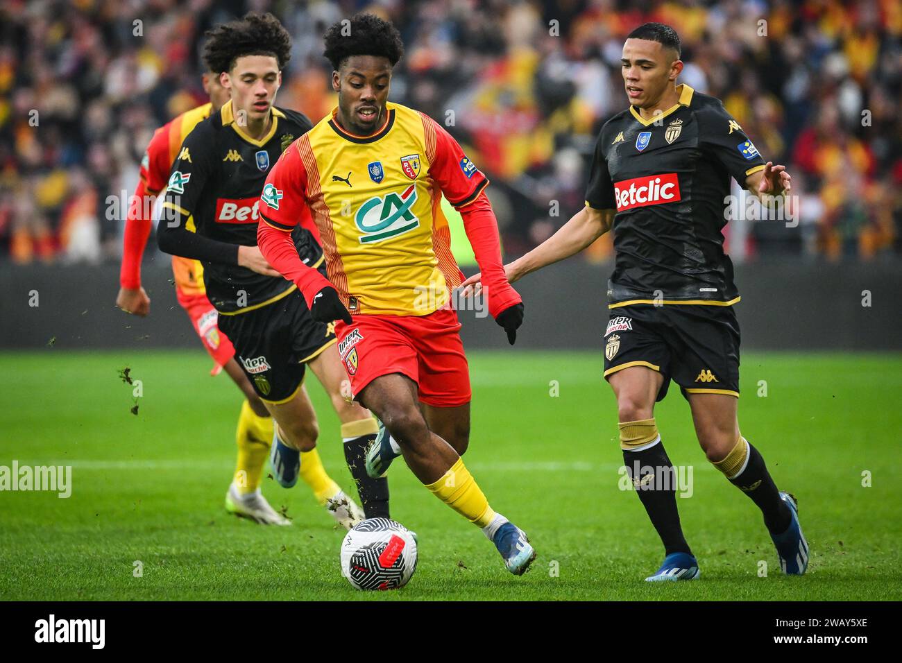 Maghnes AKLIOUCHE of Monaco, Elye WAHI of Lens and Vanderson DE ...