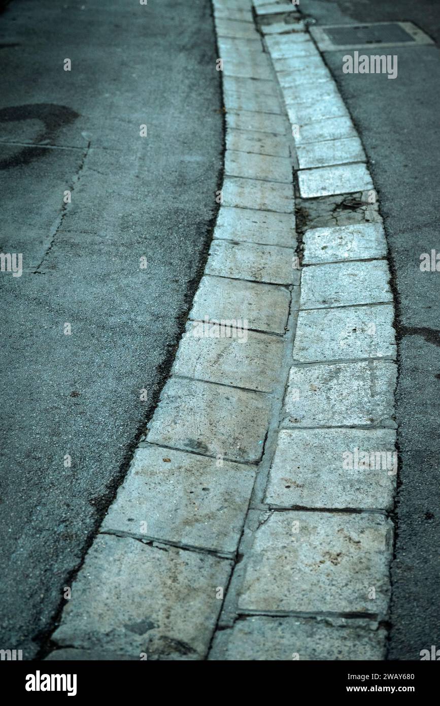 Shallow canal for taking down rainwater in a street in Montpellier ...