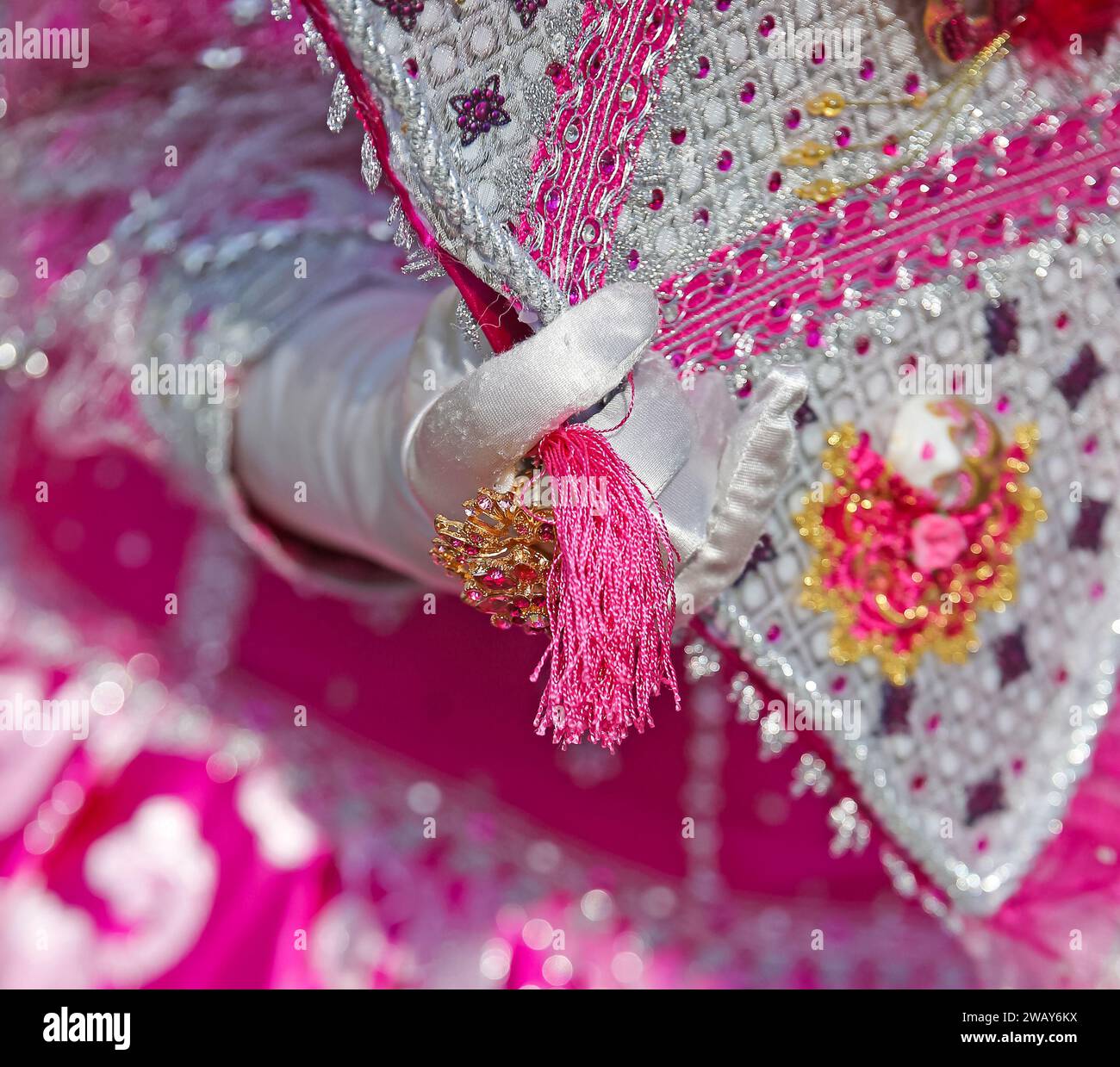 typical pink dress worn by a woman at the Venice carnival in Italy ...