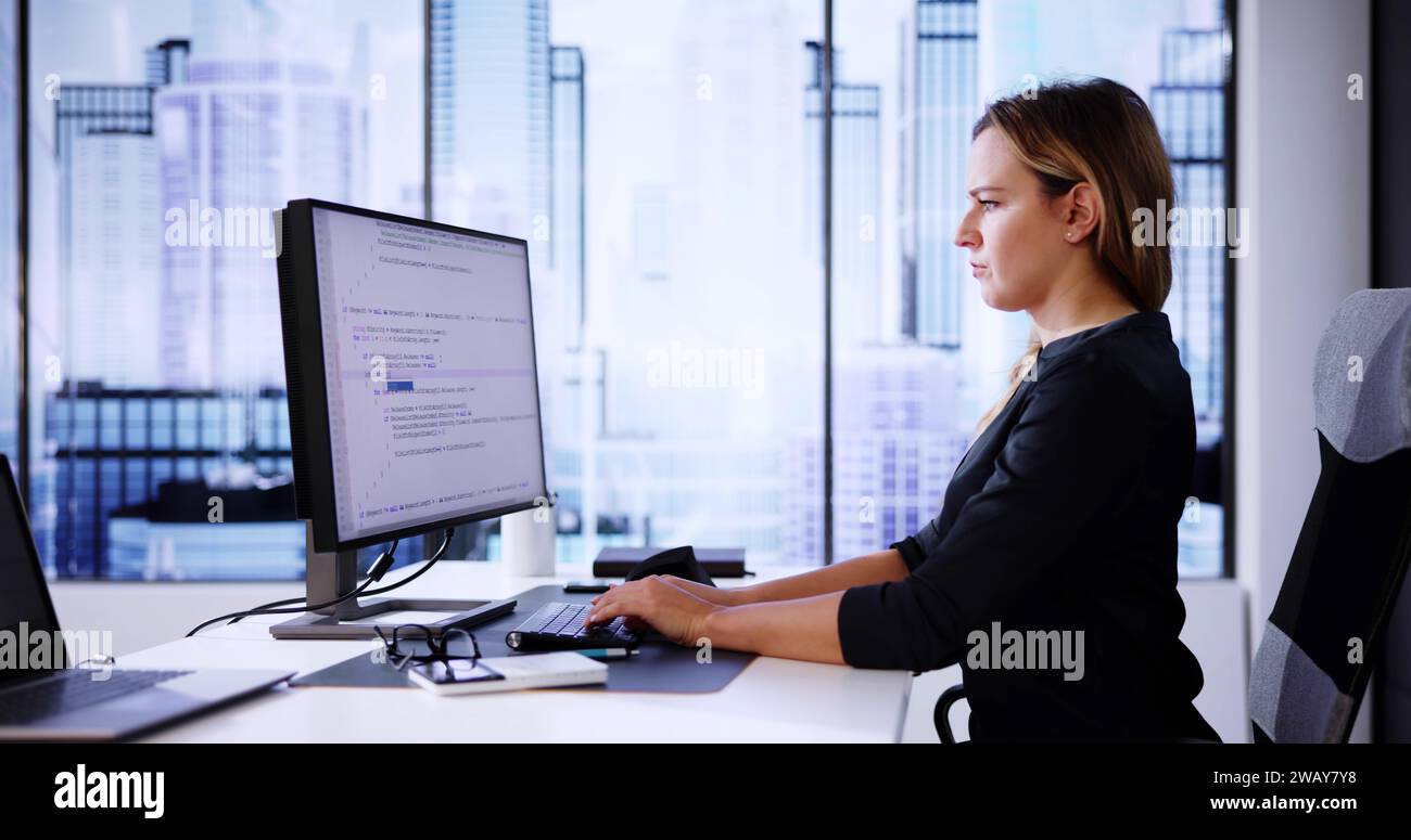 Web Developer Coding On Computer To Develop Code Stock Photo - Alamy