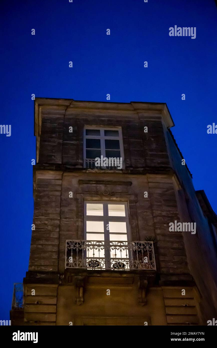 One window lit in an old house in a Street in Montpellier, France Stock ...