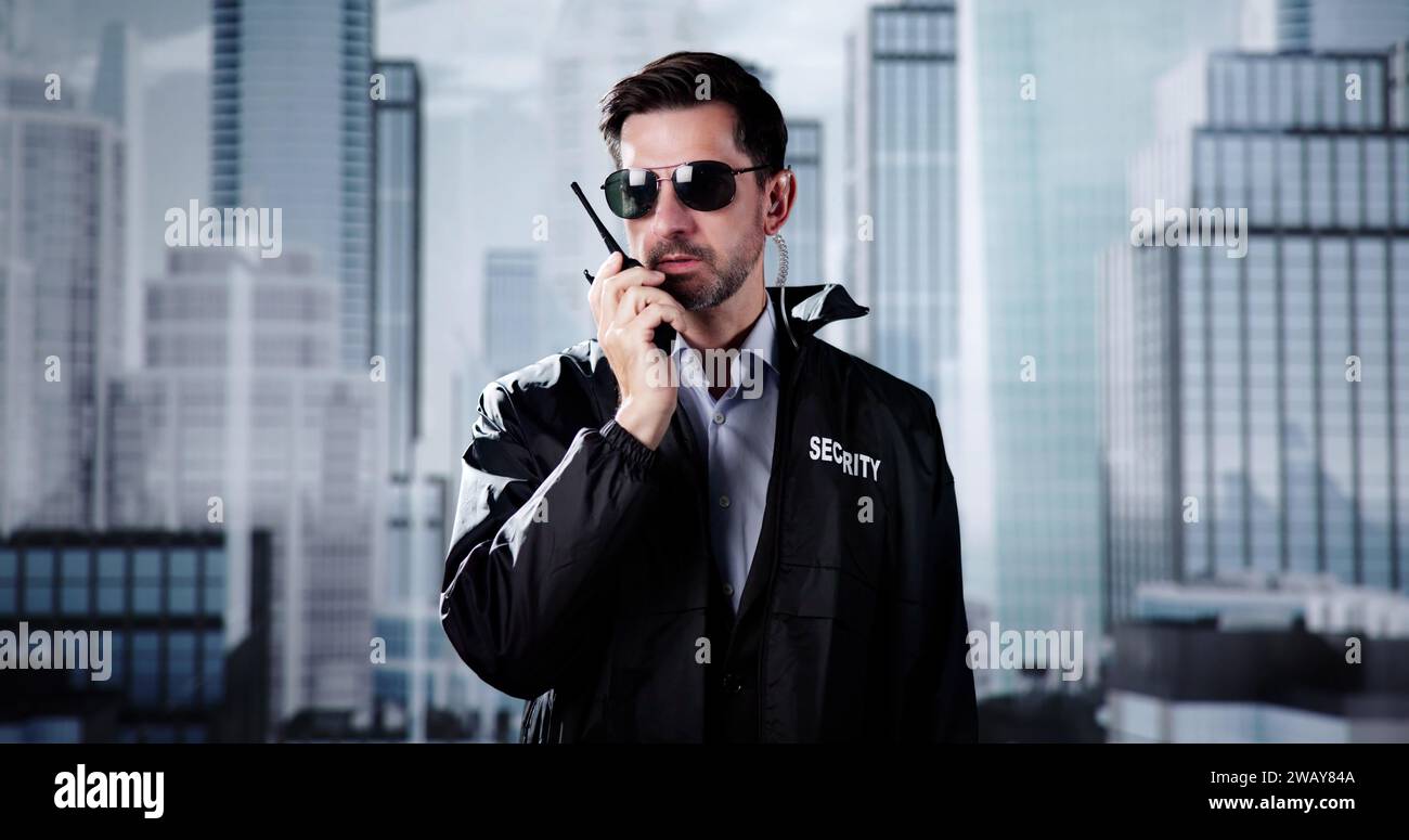 Security Guard Man Outside In Urban Area Outside Stock Photo - Alamy