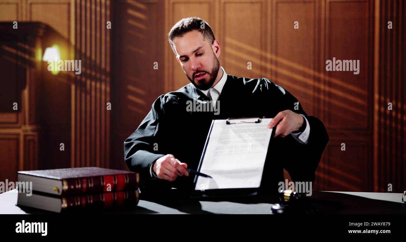 Courtroom Judge Showing Legal Document For Signing Stock Photo - Alamy