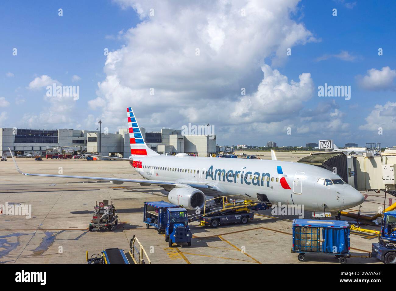 View of parked American Airlines aircraft at airport connected to jet ...