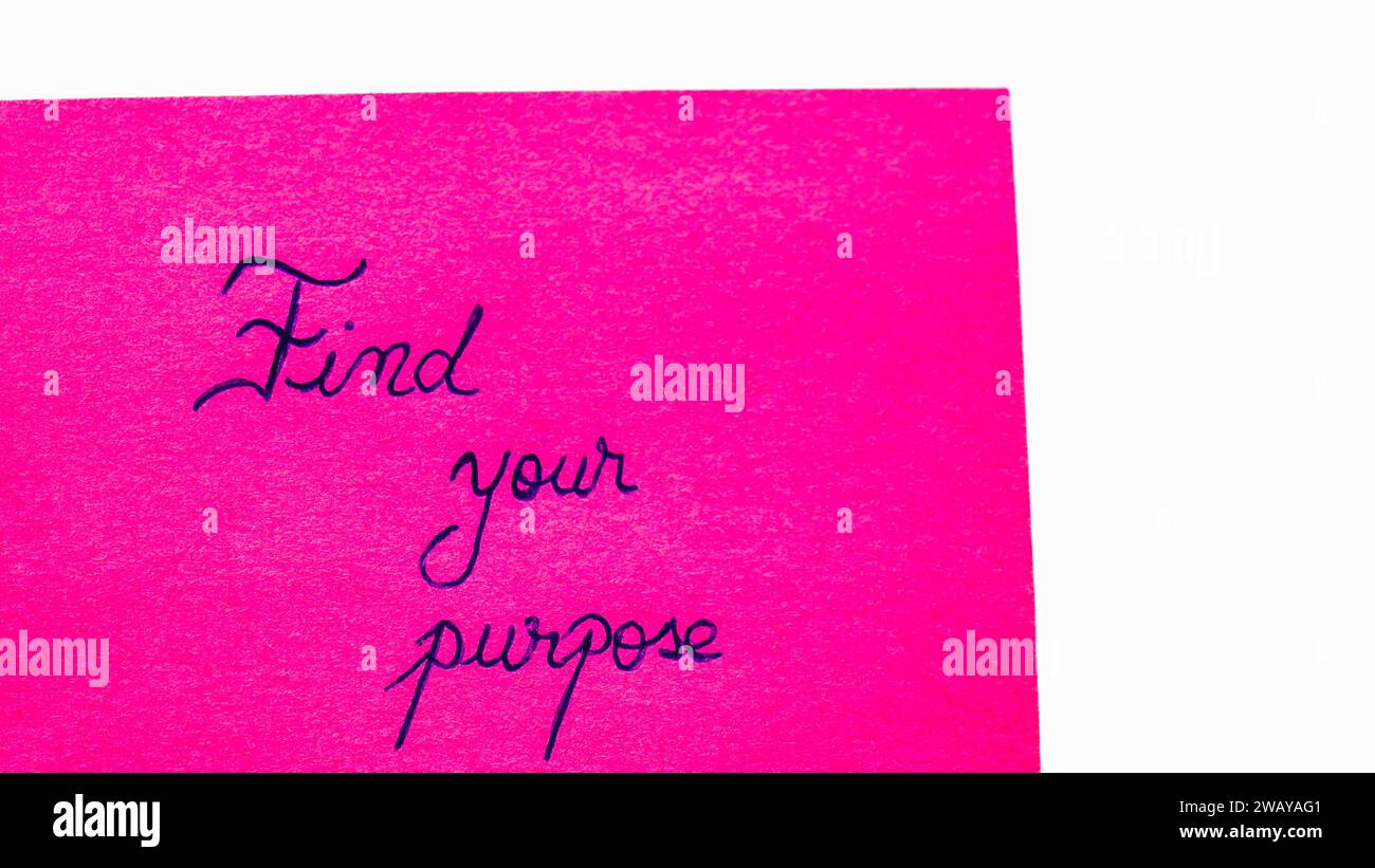 Find your purpose handwriting text close up isolated on pink paper with ...