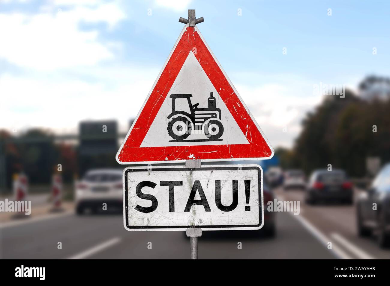 7 January 2024: Traffic jam on the highway with a traffic sign with a ...