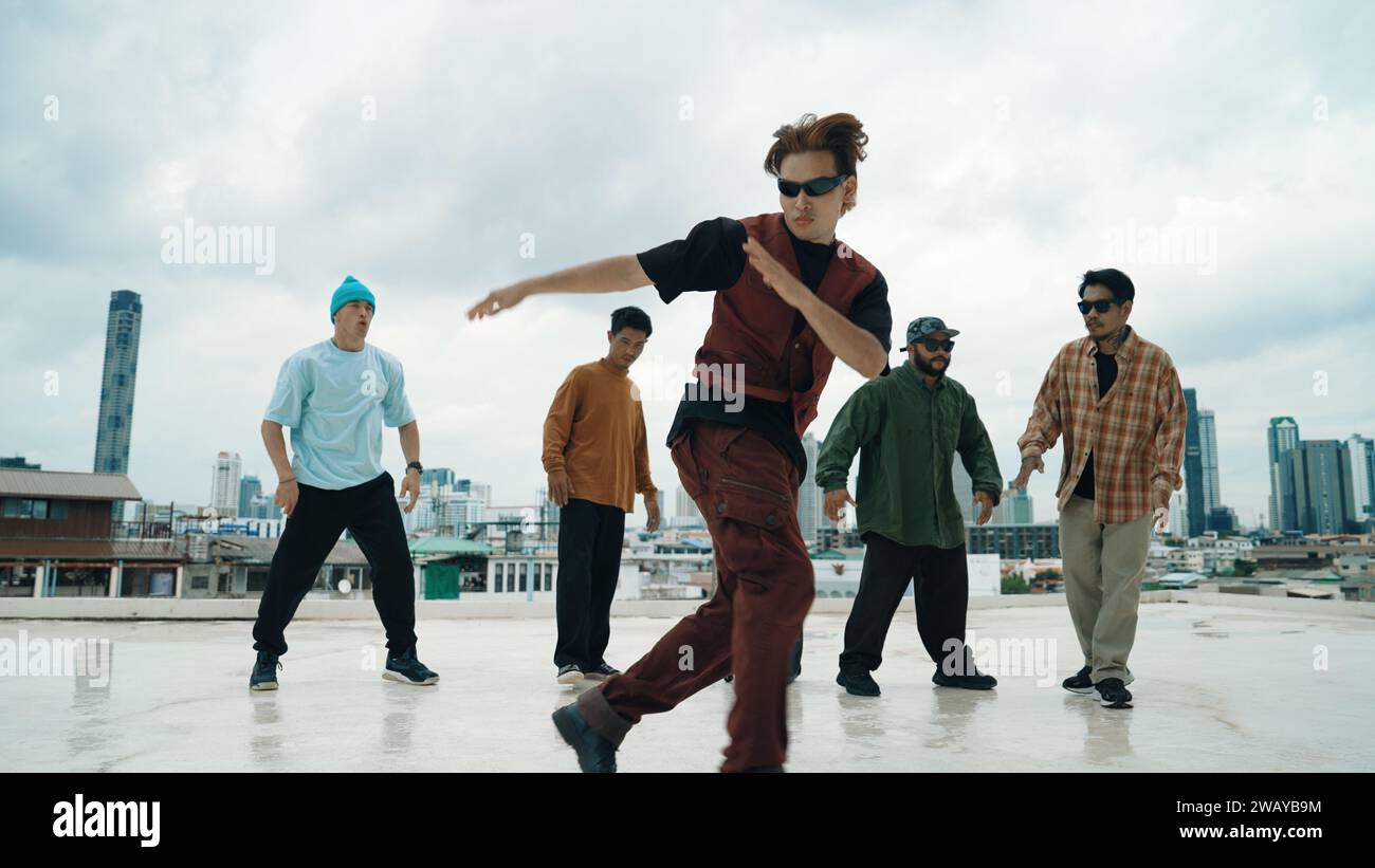 Professional break dance team practice B-boy dance while multicultural ...