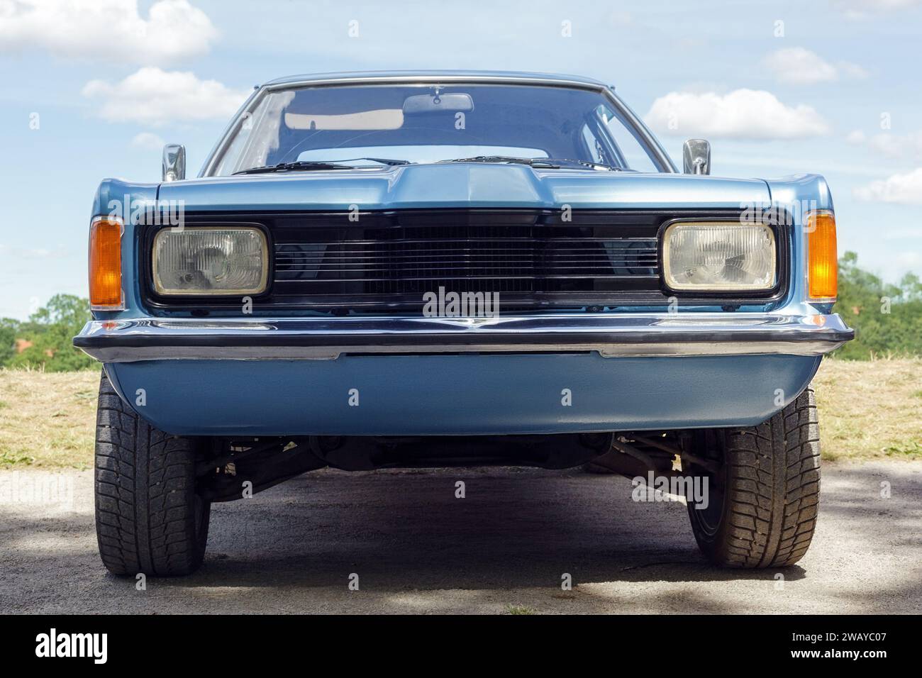 Front view of American classic blue retro car with no number plate ...