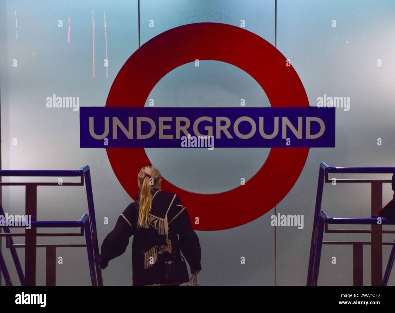 London, England, UK. 7th Jan, 2024. A passenger enters King's Cross ...