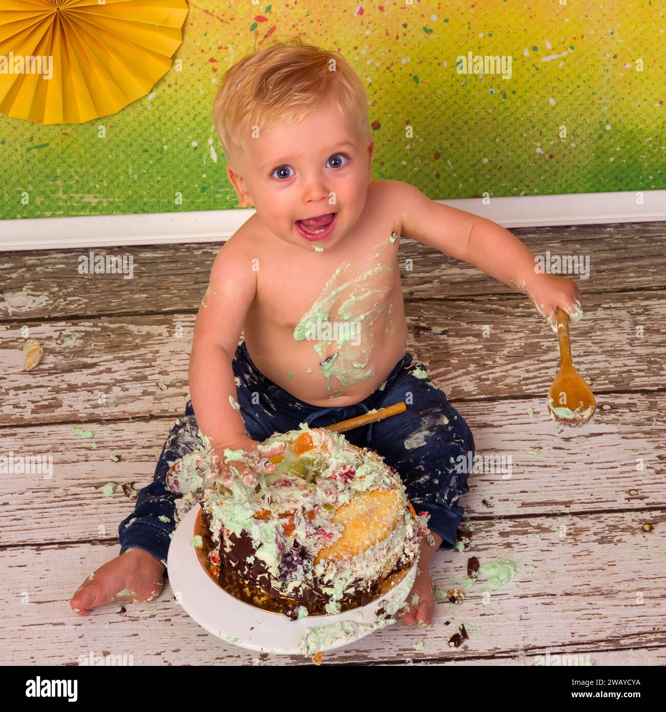 Colorful images shot during the first birthday party of a little blonde ...