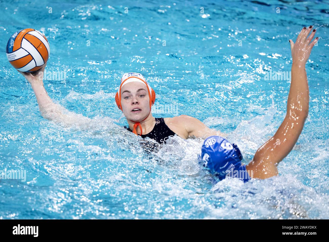 EINDHOVEN - Bente Rogge of the Dutch water polo team (f) in action ...