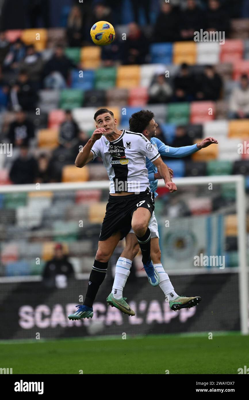 Udine Italy. 7 January, 2024. Lorenzo Lucca (Udinese)Mario Gila (Lazio ...
