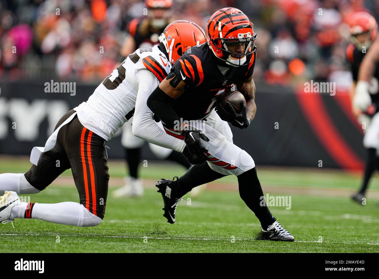 Cincinnati Bengals wide receiver Charlie Jones (15) is tackled by ...