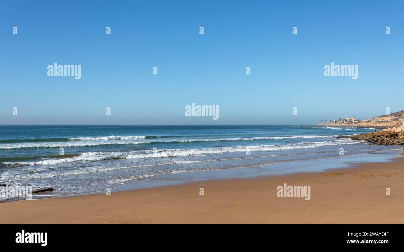 Tide ebb and flow in coastal bay, Taghazout, Morocco Stock Photo - Alamy