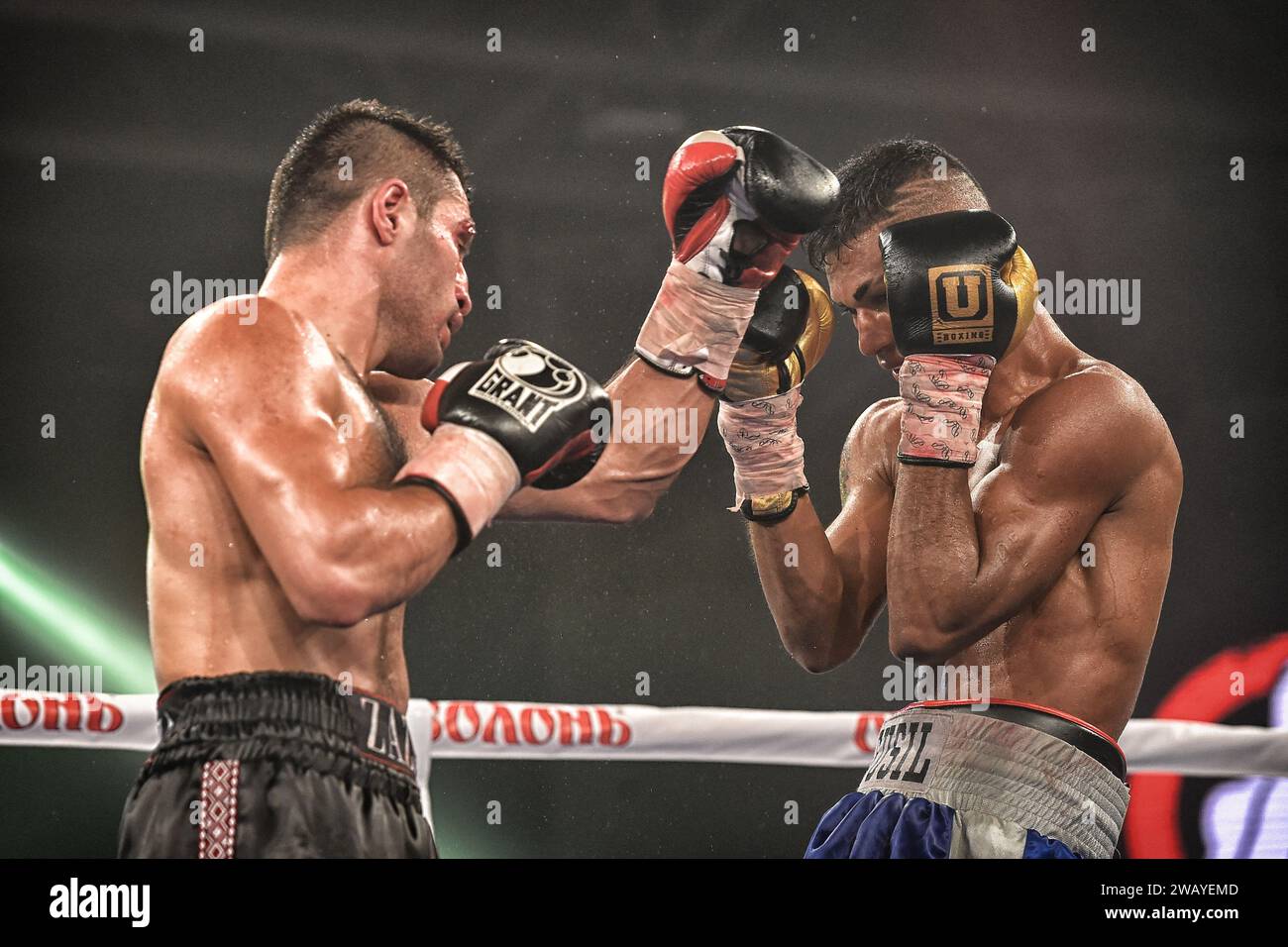 An unidentified boxers in the ring during fight for ranking points ...
