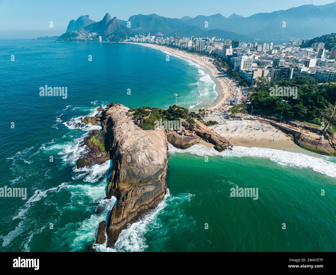 Aerial view of Diabo beach and Ipanema beach, Pedra do Arpoador. People sunbathing and playing ...
