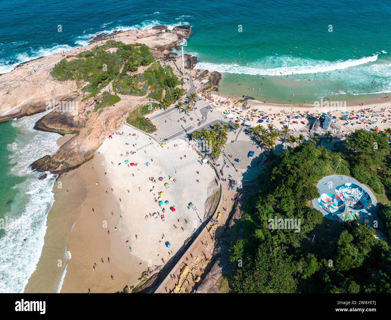Aerial view of Diabo beach and Ipanema beach, Pedra do Arpoador. People sunbathing and playing ...