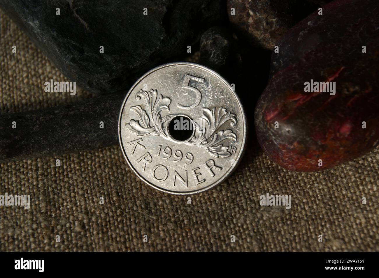 5 Kroner Harald V 1999. Norwegian coin on linen cloth. Business and ...