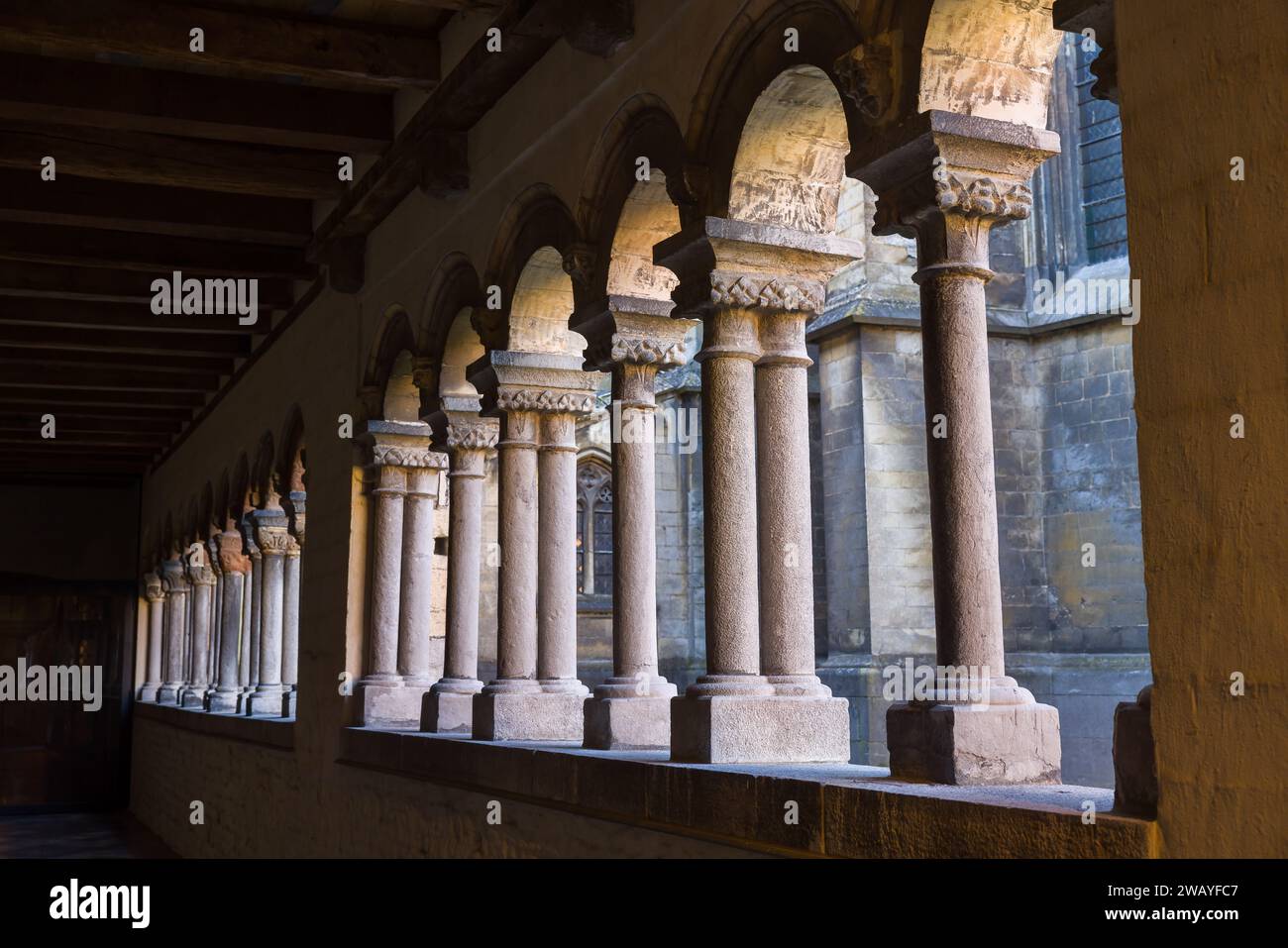 Pillars and arches of the medieval cloister courtyard of My Lady ...