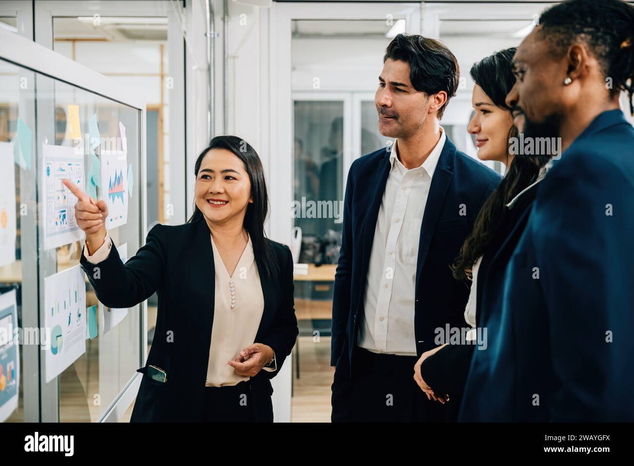 This collaborative meeting showcases colleagues' engagement in ...