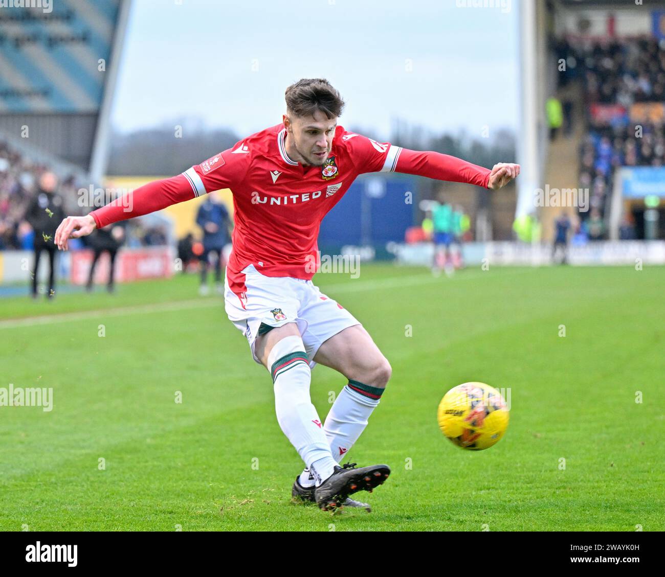 Shrewsbury, UK. 07th Jan, 2024. Ryan Barnett of Wrexham crosses the ...