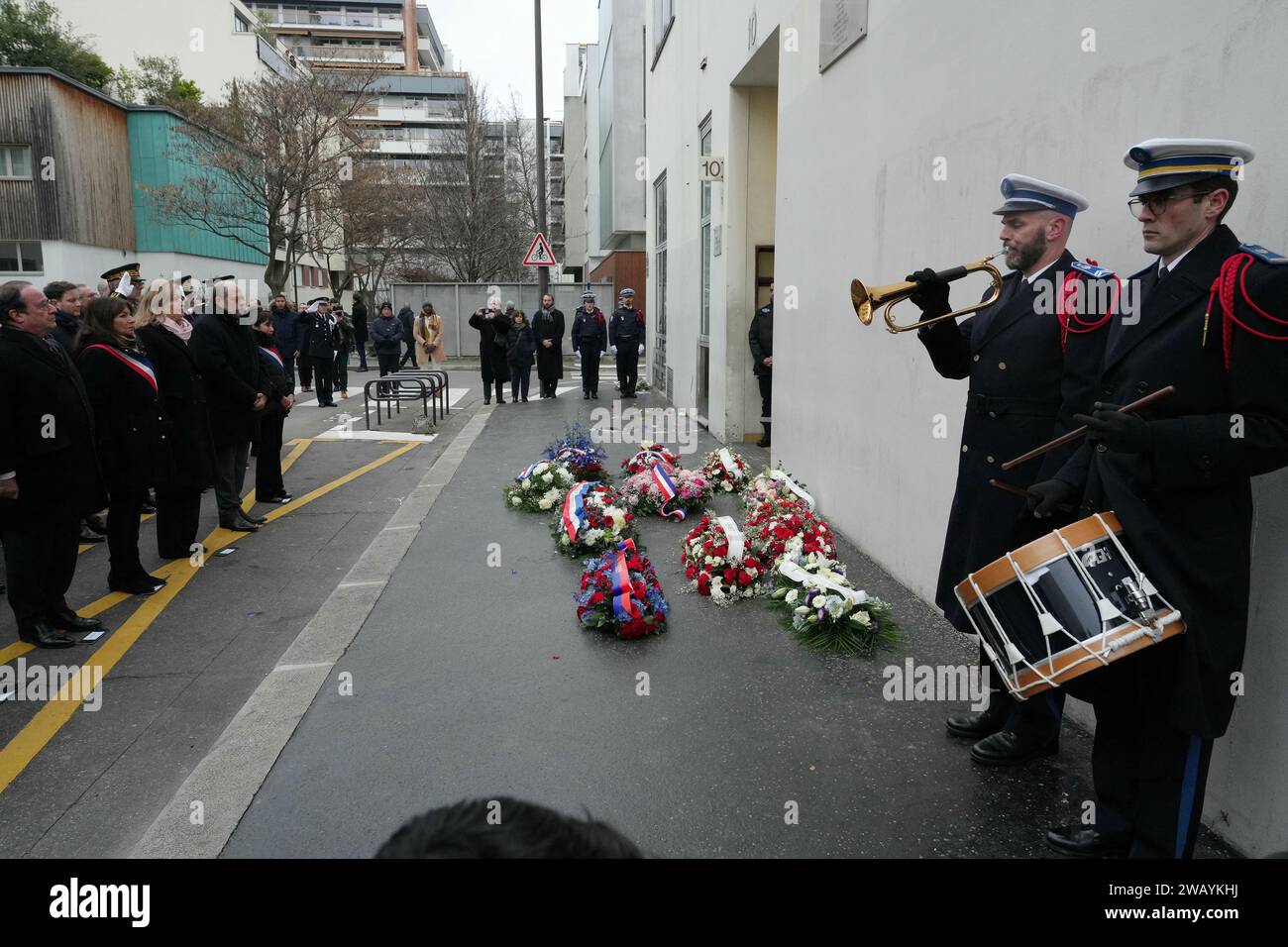 Paris, France. 07th Jan, 2024. Musicians of the police perform as (from ...
