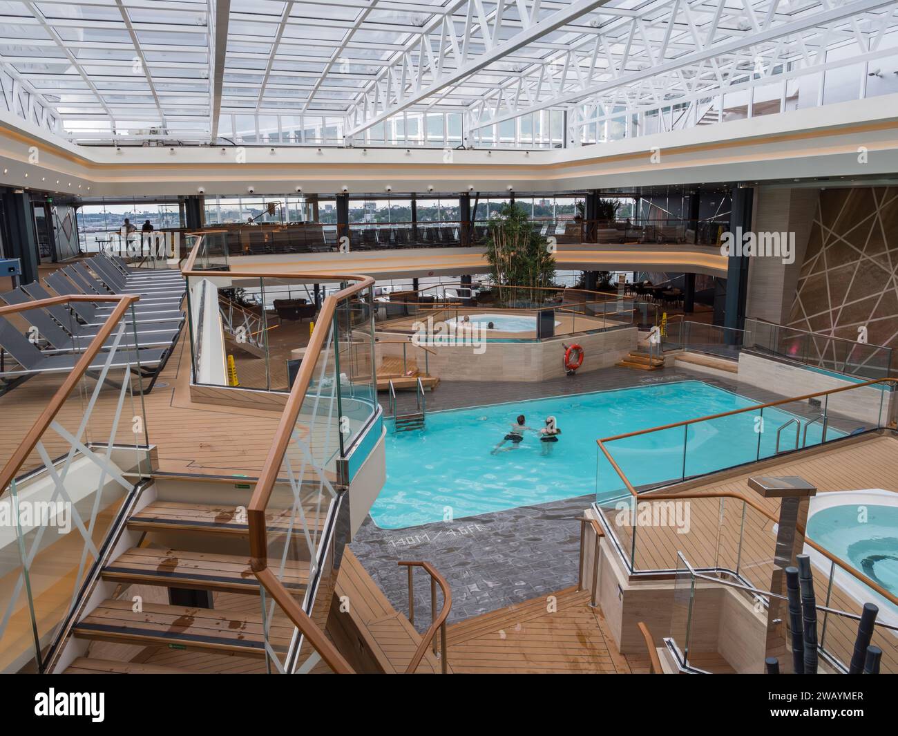 The indoor Solarium pool area on the MSC Euribia sailing in Northern ...