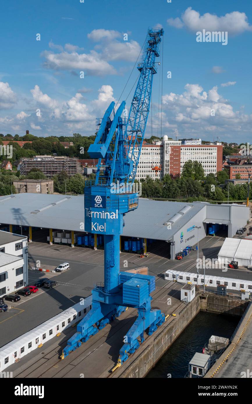 A rail-mounted dock crane in Terminal Kiel, Kiel, Germany Stock Photo ...