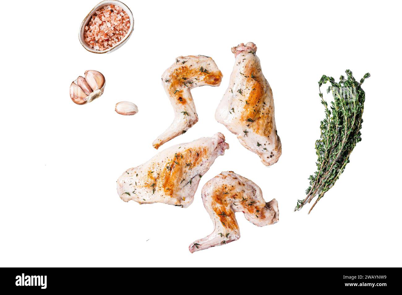 Baked rabbit legs on a grill with thyme. Isolated on white background ...
