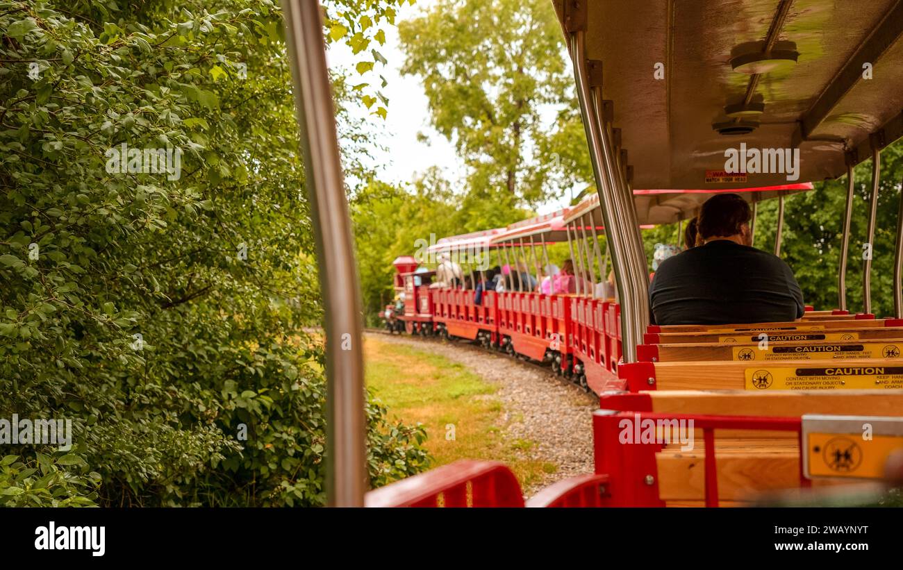 Steam locomotive and narrow gauge railroad at the Safari park on a ...