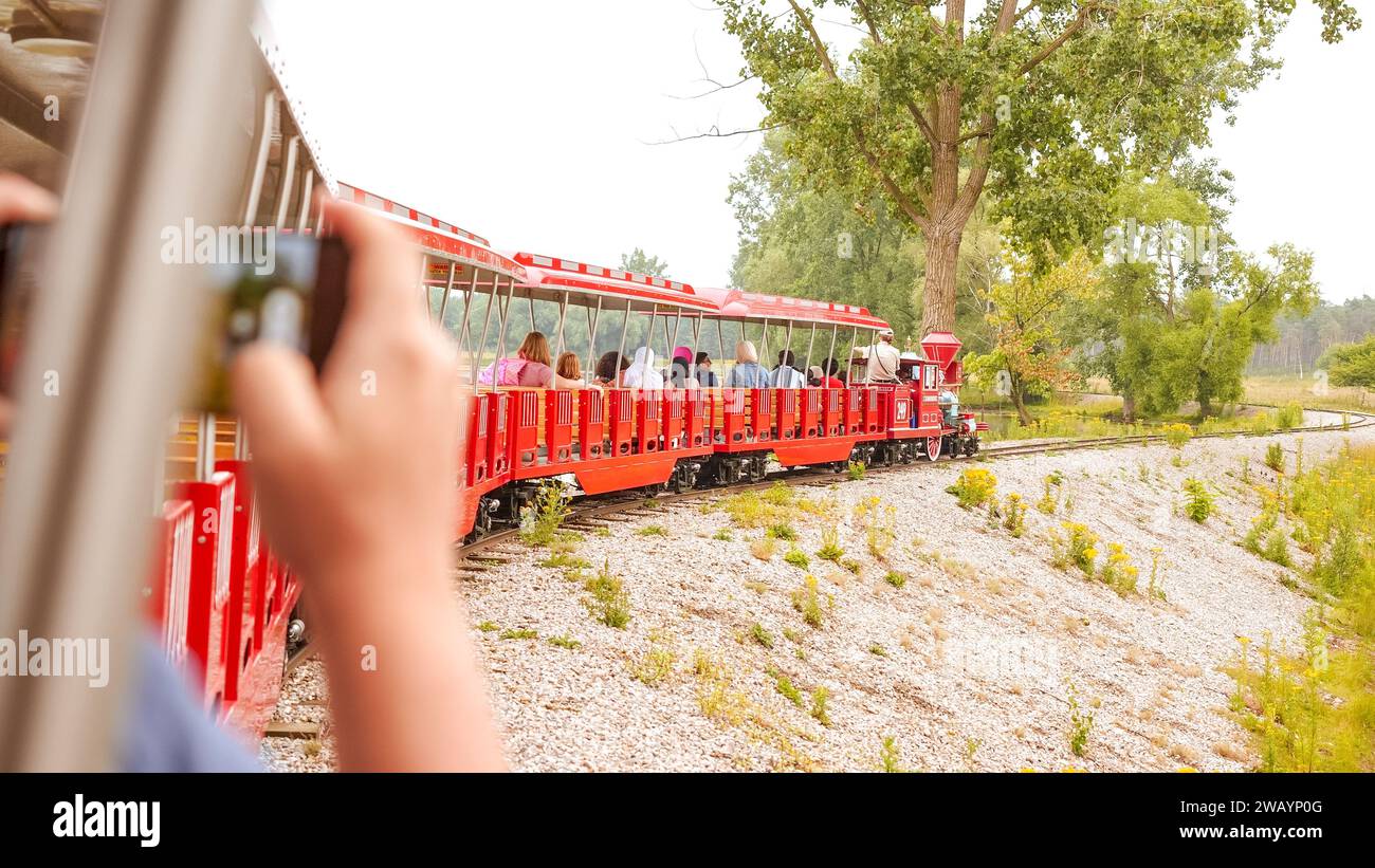 Steam locomotive and narrow gauge railroad at the Safari park on a ...