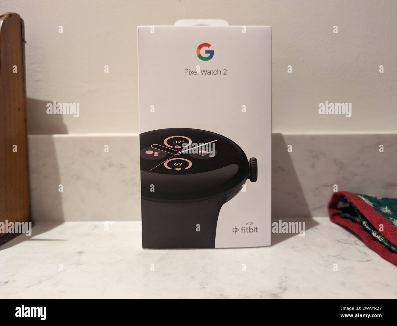 The Google Watch 2 is carefully being placed in its packaging, ready ...