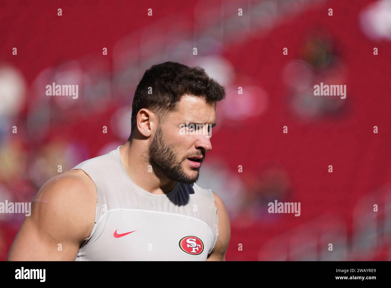 San Francisco 49ers defensive end Nick Bosa warms up before an NFL ...