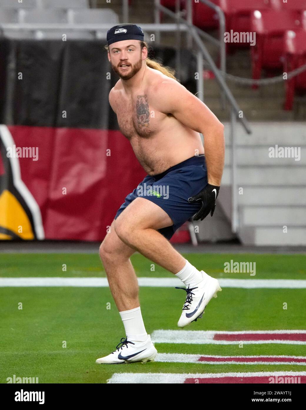 Seattle Seahawks tight end Brady Russell warms up before an NFL football game against the ...