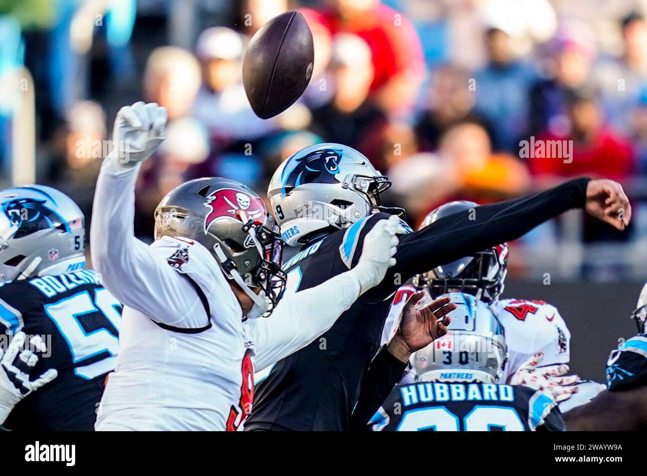 Tampa Bay Buccaneers linebacker Joe Tryon-Shoyinka (9) forces a fumble ...