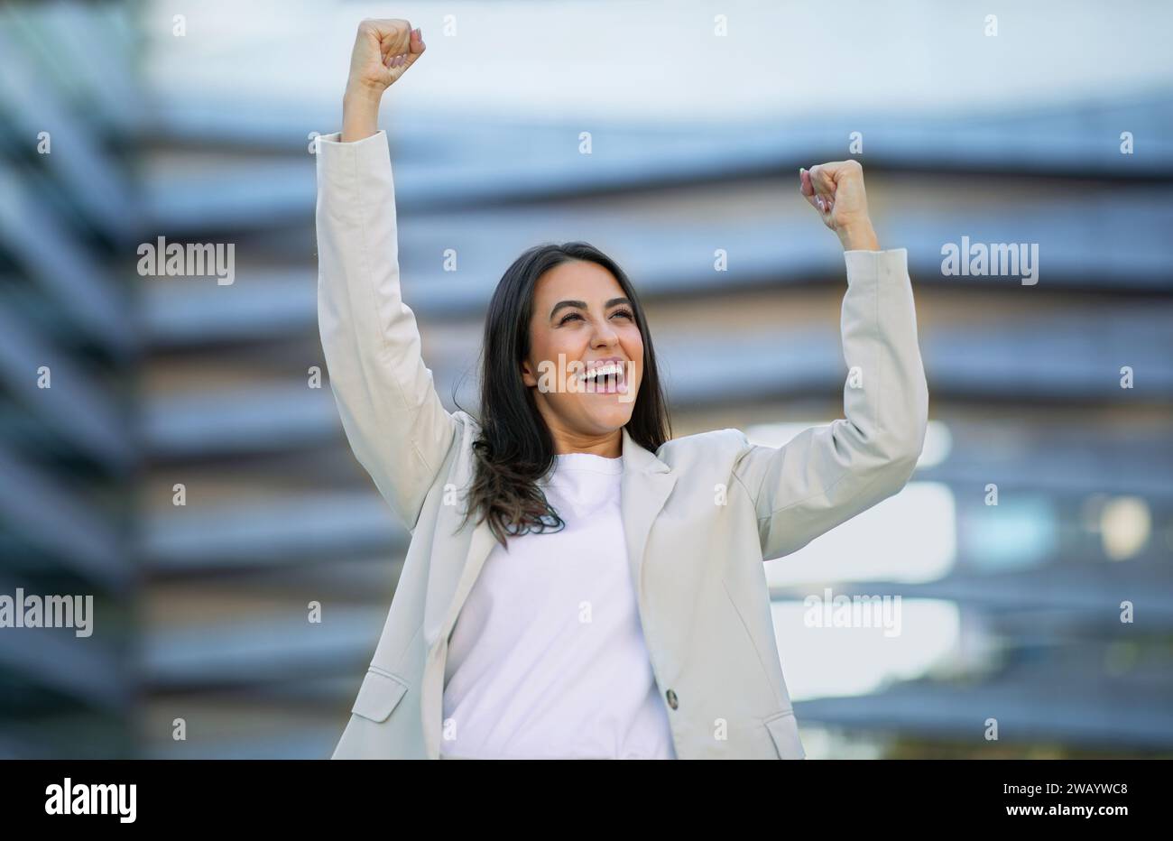 Joyful business lady shaking hi-res stock photography and images - Alamy