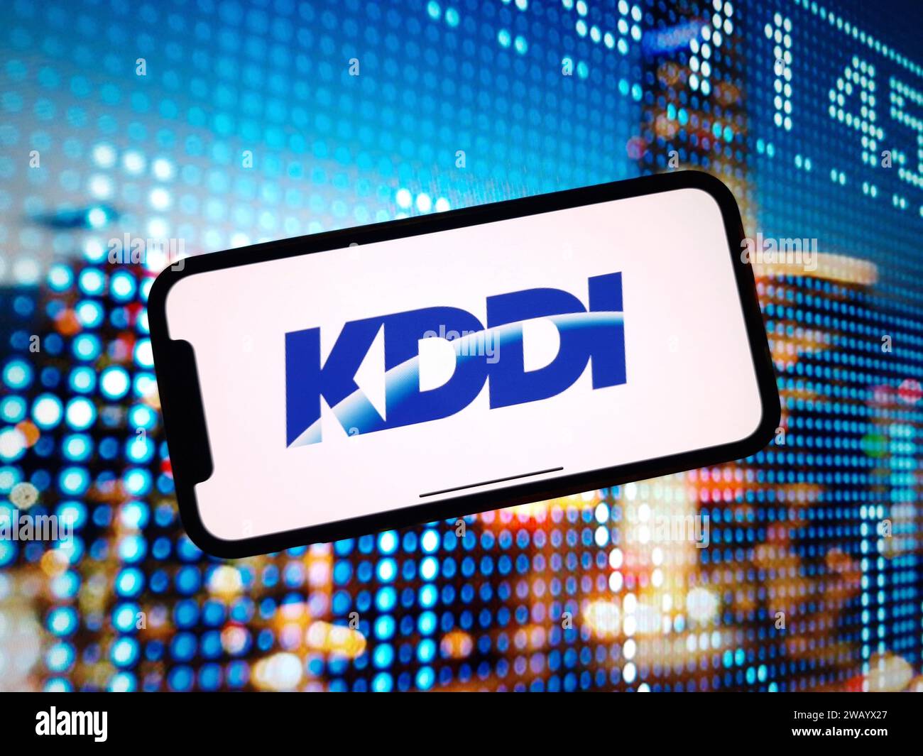 Konskie, Poland - January 07, 2024: KDDI company logo displayed on mobile phone screen Stock ...