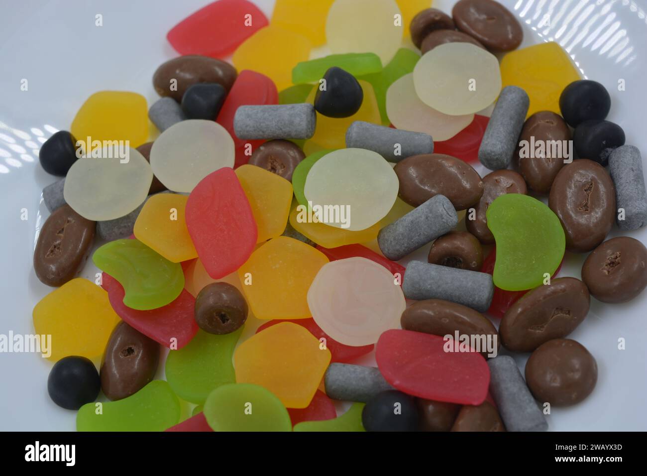 Mix, assorted of unusual branded factory gummy candies in the form of ...