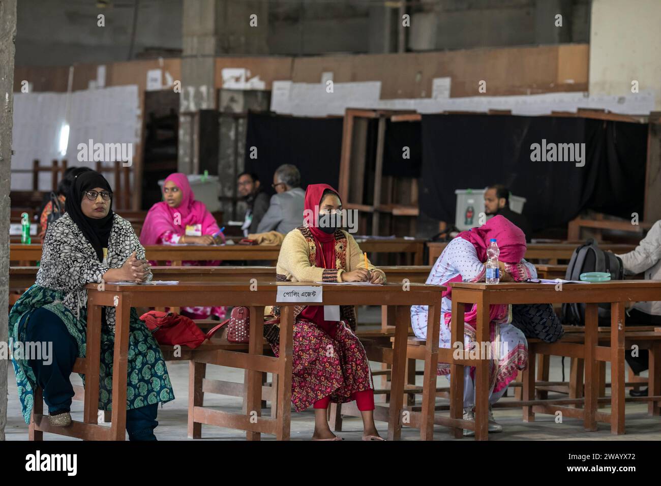 Dhaka, Bangladesh. 07th Jan, 2024. Election officials wait inside a ...