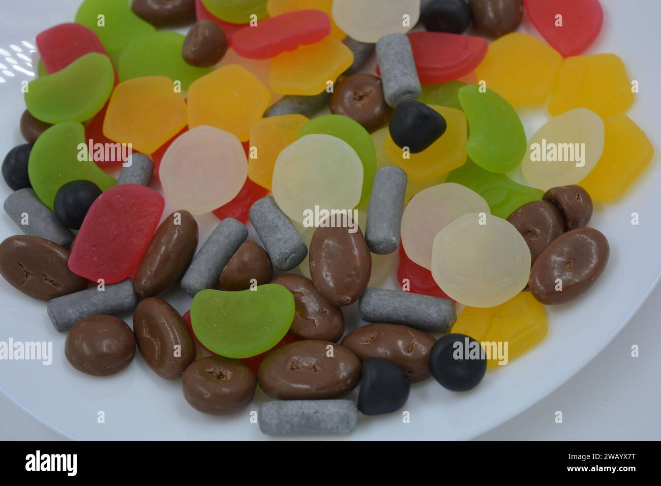 Mix, assorted of unusual branded factory gummy candies in the form of ...