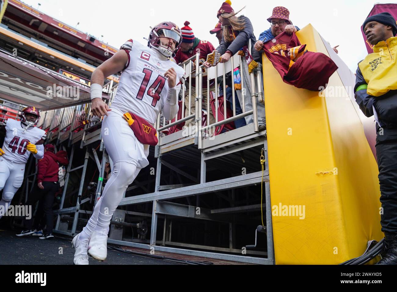 Washington Commanders quarterback Sam Howell (14) taking the field ...
